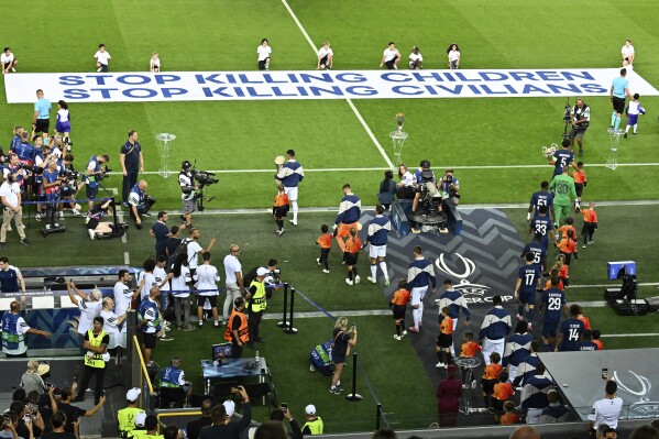 UEFA displays ‘Stop killing children’ banner at PSG-Tottenham match - EJP